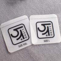 China Transparent Soft TPU Clothing Labels with 3D Embossed Effects - Custom Sizes & CMYK Colors for Swimwear & Apparel for sale