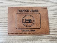 China Custom Embossed Logo PU Leather Patches Sew On Clothing 100 Pcs Min Order for sale