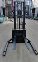 China Extremely safe and stable stacker 1.6ton 3.5m 4m Full Electric walkie Stacker with straddle legs and forged fork for sale