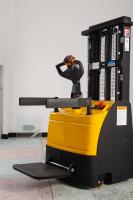 China 2 Ton Max 5.5m Battery Lifter Electric Pallet Truck Stacker With High Power for sale
