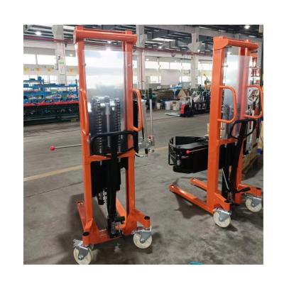 China Easy-to-operate manual paper roll stacker roll lifter with clamps and nylon wheels 90 180 360 rotation for sale