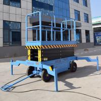 China 320kg hydraulic lifting platform scissor lift home small movable hydraulic lift for sale