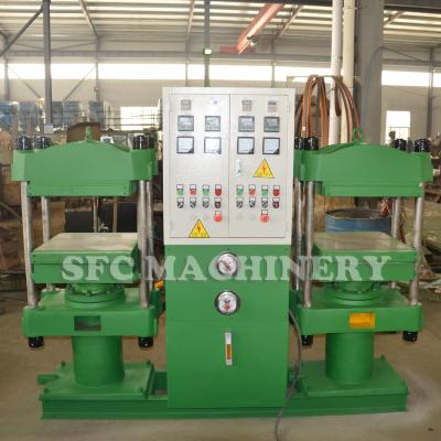 China PLC Full Automatic Twin Vulcanizing Press with 650x650 Dual Chamber and Advanced PLC Control System for sale