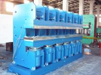 China Frame-type flat vulcanizing press with integrated cast steel jaw opening frame and intelligent constant temperature & pressure system for high structural rigidity for sale