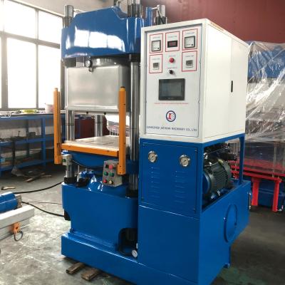 China Rubber Hydraulic Press Vacuum Compression Molding Machine For Silicone Foldable Bowl Bottle for sale