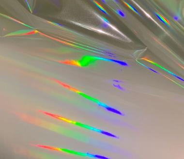 China BOPP  15 micron transparent holographic film,Light beam laser with primer PU printing for sale