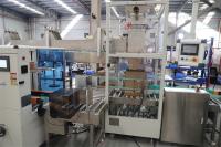 China Beverage Drop Load Bottle Case Packer Machines Mineral Water High Speed Case Packer for sale