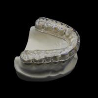 China Custom Medical Grade Acrylic Bruxism Guard 1.5mm 3mm Teeth Whitening Trays Jaw Strain Reduction for sale