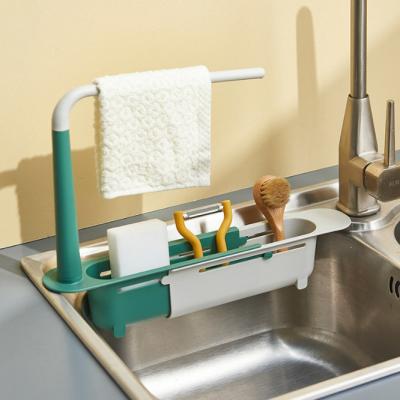 China Adjustable Telescopic Sink Storage Rack 2-in-1 Stainless Steel 23.5-40cm for sale
