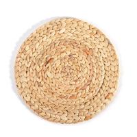 China Natural Water Hyacinth Round Braided Placemats 25cm Heat Resistant Woven Table Mats for sale