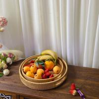 China Multifunction Hand Woven Rattan Round Serving Tray Serving Basket With Cut for sale