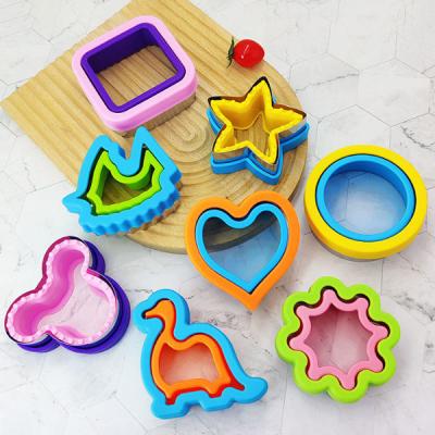China Stainless Steel Sandwich Cutter Set 4 Shapes Heart Star Circle Dinosaur DIY Bread Mold for sale