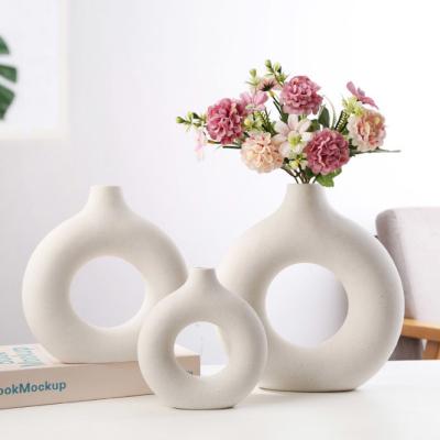 China Modern Nordic Ceramic Vase 17x18x5.5cm Donut Shape Home Decor White Flower Vase for sale