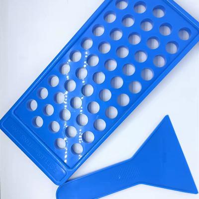 China 50 Hole Cosmetic Lip Balm Filling Tray with Spatula Plastic Tube Holder for sale