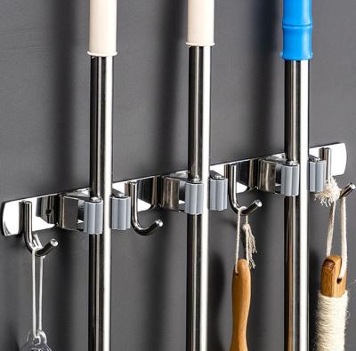 China 60cm Wall Mount Stainless Steel Mop and Broom Holder Organizer 5 Racks 4 Hooks for sale