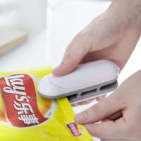 China Mini Bag Sealer 2 in 1 Heat Sealer and Cutter for Plastic Bags Handheld 60g ABS for sale
