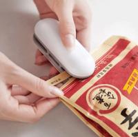 China Mini Bag Sealer 2 in 1 Heat Sealer and Cutter for Plastic Bags Handheld 60g ABS for sale