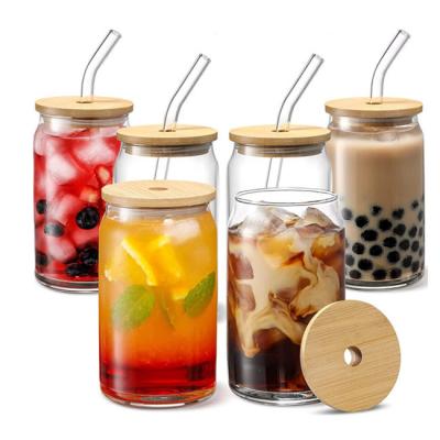China 16oz Clear Glass Mason Jars with Bamboo Lids and Glass Straws for Juice Soda Beer for sale