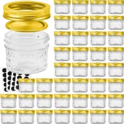 China 100ml Wide Mouth Mini Glass Preserve Jars for Jam Caviar 40 Pack with Gold Lids for sale