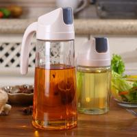 China Auto Flip Olive Oil Dispenser Bottle 300ml 600ml Glass On-Slip Handle Kitchen for sale