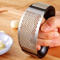 China 304 Stainless Steel Garlic Press Rocker 10.5cm Ergonomic Handle Mincer Crusher for sale