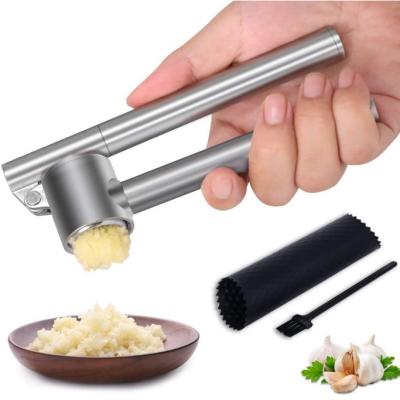 China 304 Stainless Steel Garlic Press Mincer with Peeler Set 10.5cm Ergonomic Handle for sale