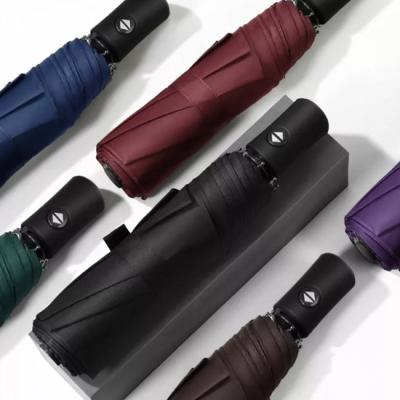 China Windproof Automatic Open 3 Folding Umbrella 95cm Canopy 27.5cm Folded Pongee Custom Logo for sale