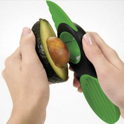 China Stainless Steel 3-in-1 Avocado Slicer 19.5cm Green Kitchen Tool Split Pit Slice for sale