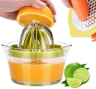 China Manual Bulk Kitchen Supplies Orange Lemon Squeezer Juicer With Measuring Cup Grater for sale