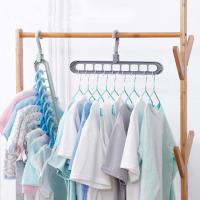 China Folding Rotating Plastic Clothes Hangers 360 Degree Anti Skid Space Saving Closet Organizer 9 Garment Capacity for sale