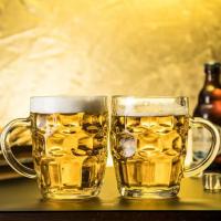 China Large Plastic Custom Drinking Cups Dimple Stein Beer Mugs with Handle 20oz for sale