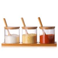 China Glass Spice Jars Bulk 10oz with Bamboo Lid Spoon Set of 3 Reusable Seasoning Containers for sale