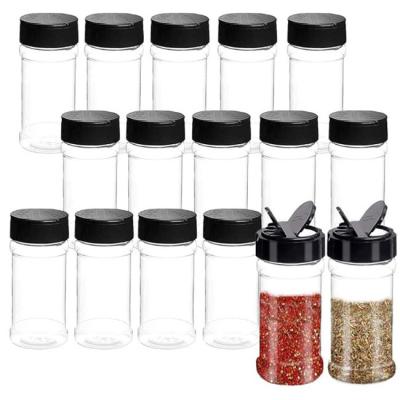 China Bulk 3.5oz Plastic Spice Jars with Black Screw Lids 100ml Clear Seasoning Bottles for sale