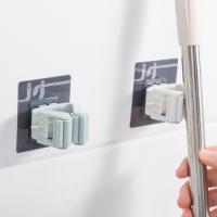 China Custom Wall Mounted Mop And Broom Holder Gripper Tools for sale