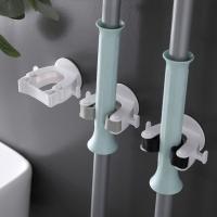 China Self Adhesive Mop Broom Holder Wall Mount Gripper 7x5.5cm ABS Non-Slip Organizer for sale
