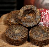China Organic Pu Erh Mini Tuo Cha , Cooked Yunnan Puer Tea Cake With Powerful Flavor for sale