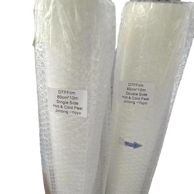 China 30cm 33cm PET Film Roll Double Side High Temperature Hot Peel Heat Transfer DTF Film for sale