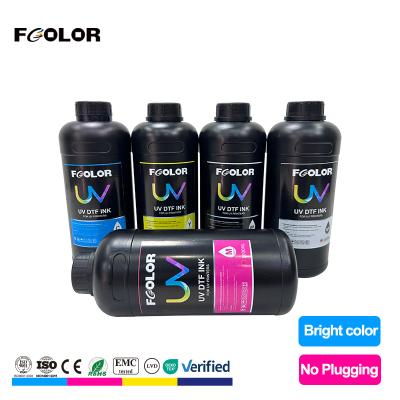 China 1000ML Flexible UV DTF Ink High Elasticity TPU UV Ink For T Shirt Sportwear 3D Puff Design for sale