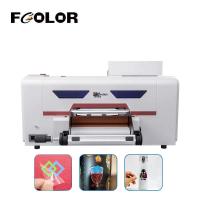 China Full Automatic Uv Dtf Printer Machine 42CM Multifunctional Laminating A2 Uv Dtf Printer with XP600 Head for sale