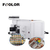 China Full Automatic Uv Dtf Printer Machine 42CM Multifunctional Laminating A2 Uv Dtf Printer with XP600 Head for sale
