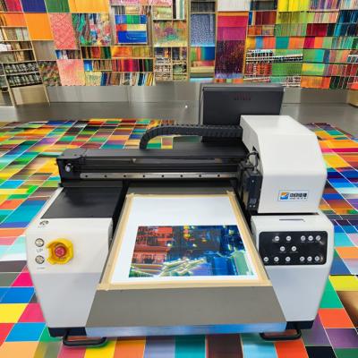 China FCOLOR A3 Flatbed DTF UV Inkjet Printer for Customizing Phone Cases Pens Mugs Bottles Glasses Wood Metal Acrylic for sale