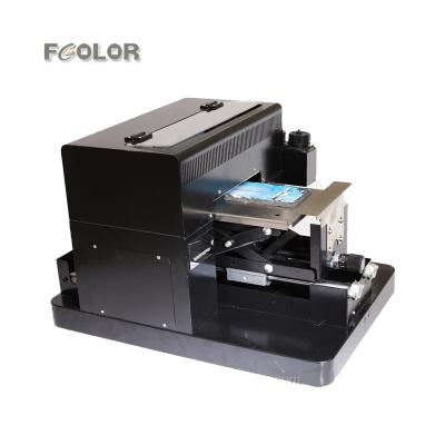 China FCOLOR Size Small A4 UV LED Flatbed Printer Mini UV Printing Machine for sale