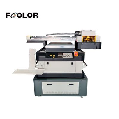 China FCOLOR High Resolution 4800DPI 6090 UV Flatbed Printer Epson I3200 3 Heads CMYK White Varnish 30cm Height for sale