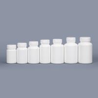 China White Round Plastic Pill Bottles 30ml 60ml with Custom Engraving for Pharmaceutical Storage for sale