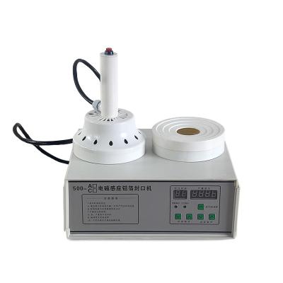 China Large-caliber Electromagnetic Induction Bottle Sealing Machine for Aluminum Foil Carton Packaging 220V Industrial Grade for sale