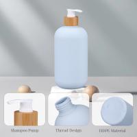 China HDPE Plastic Shampoo Bottle with Bamboo Lid - 500ml Soft Touch Empty Body Lotion Container for sale