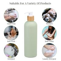 China HDPE Plastic Shampoo Bottle with Bamboo Lid - 500ml Soft Touch Empty Body Lotion Container for sale