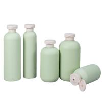China Avocado Green Flip Top Cap Pump Bottle 100ml-500ml for Cosmetic Skincare Packaging with OEM Options for sale
