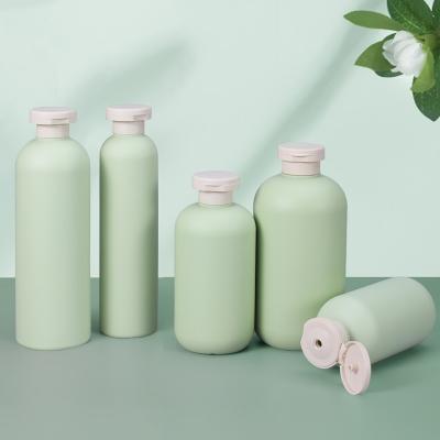 China 200ml 260ml 300ml 400ml 500ml HDPE Plastic Lotion Bottle With Flip Top Cap for Shampoo for sale