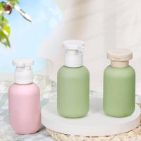 China 100ml Avocado Green Plastic Lotion Bottle With Flip Top Cap for sale